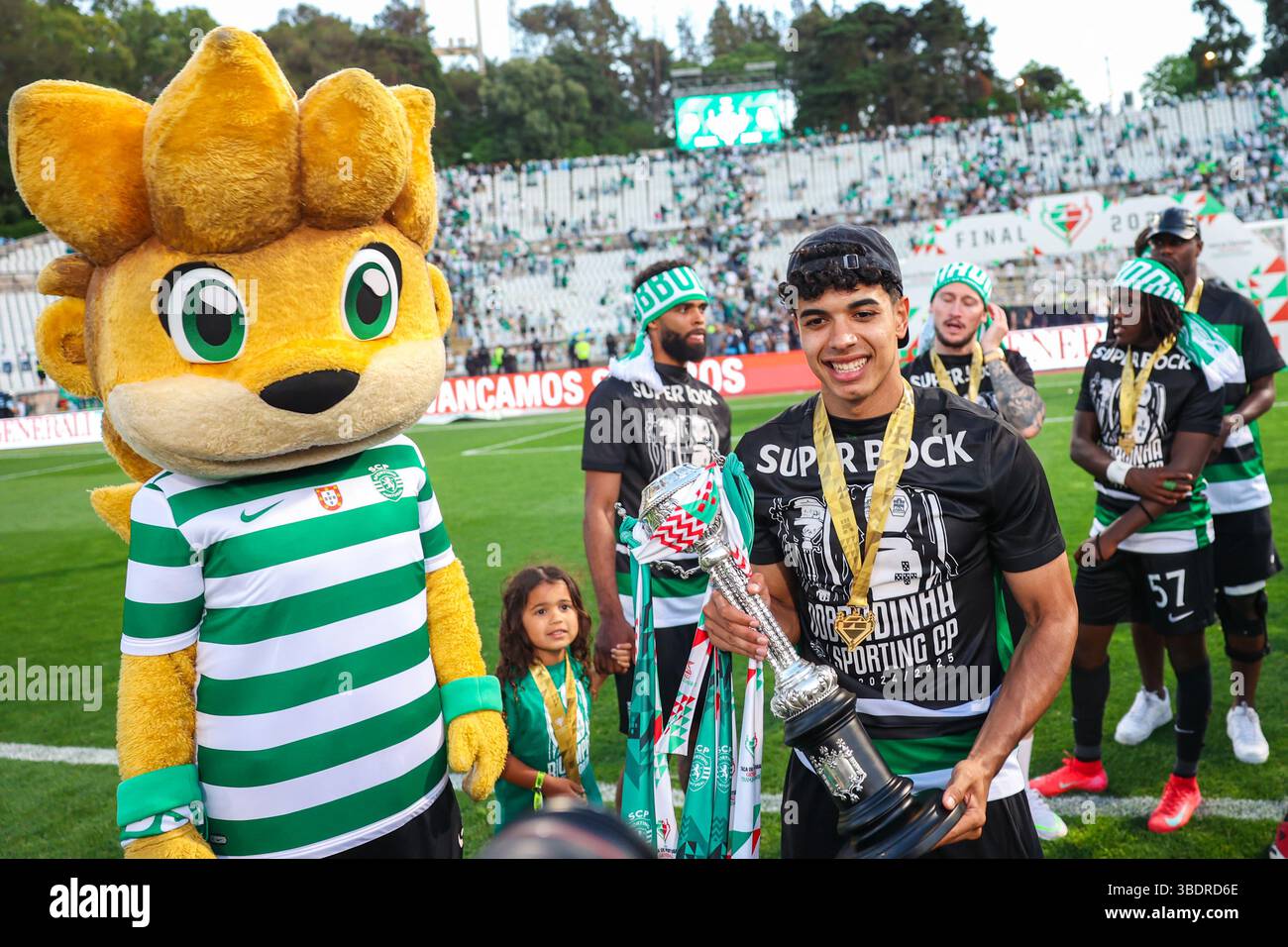 Joao Simoes Sporting CP celebrates with the trophy at the end of the ...