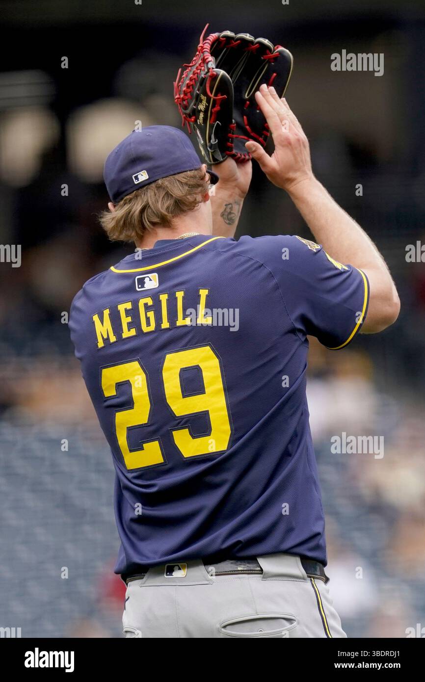 Milwaukee Brewers pitcher Trevor Megill celebrates after getting the ...