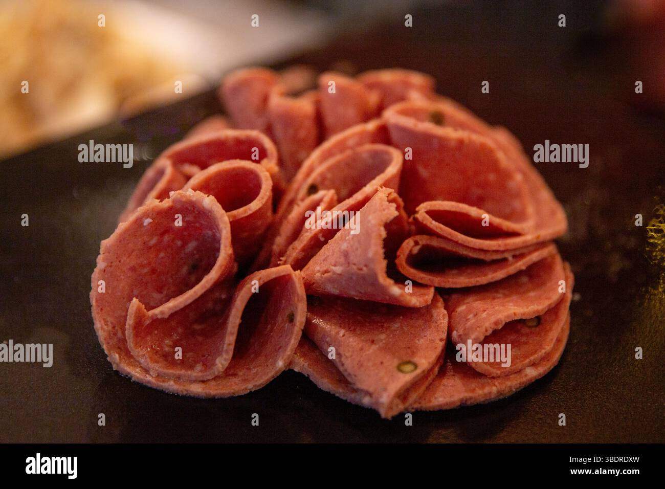 Cold cut chicken with pepper at a buffet Stock Photo - Alamy