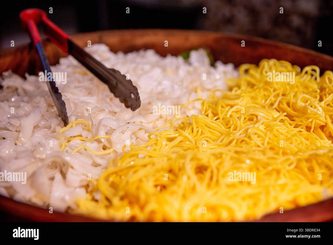 Two different type of noodles at an asian buffet Stock Photo - Alamy