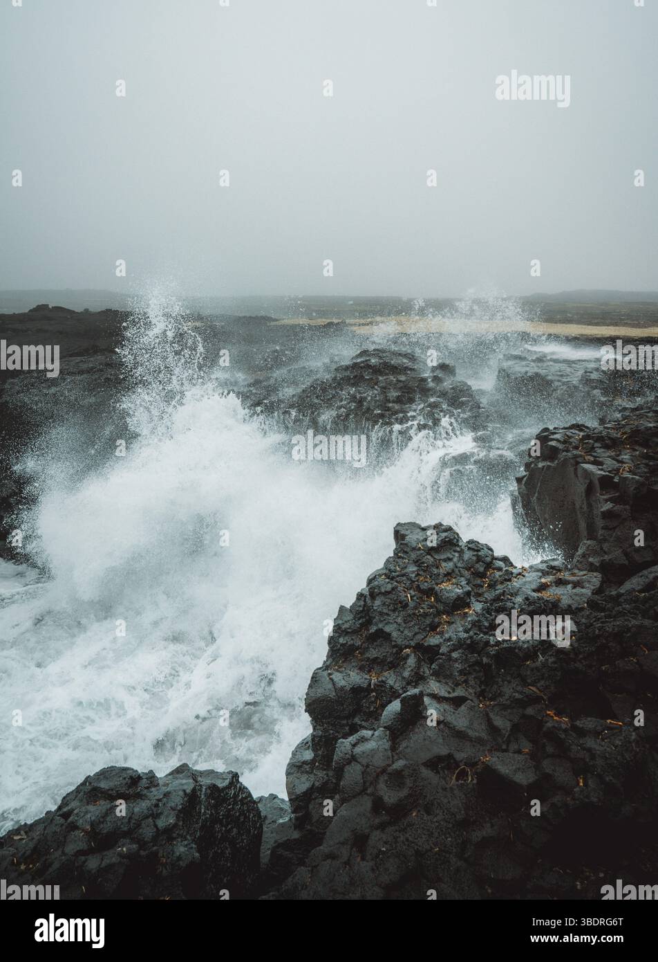 Dramatic Volcanic Coastline with Ocean Waves and Dark Basalt Cliffs in ...