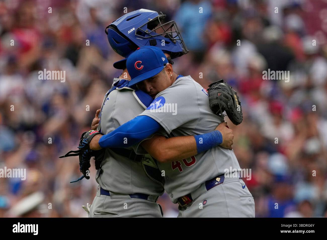 Chicago Cubs' catcher Reese McGuire, left, and pitcher Daniel Palencia ...