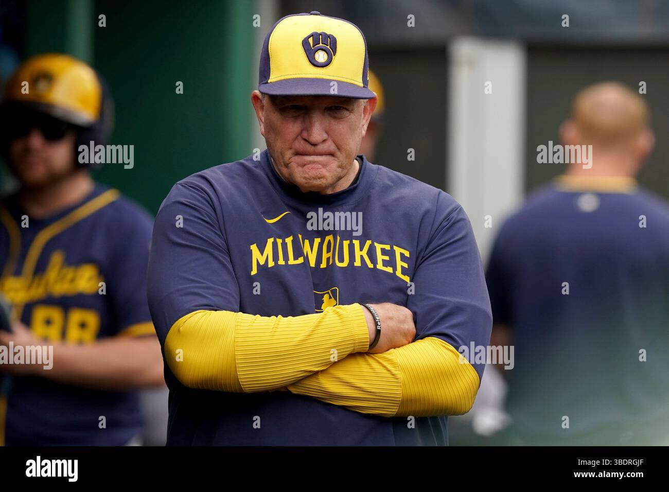 Milwaukee Brewers manager Pat Murphy stands in the dugout during the ...