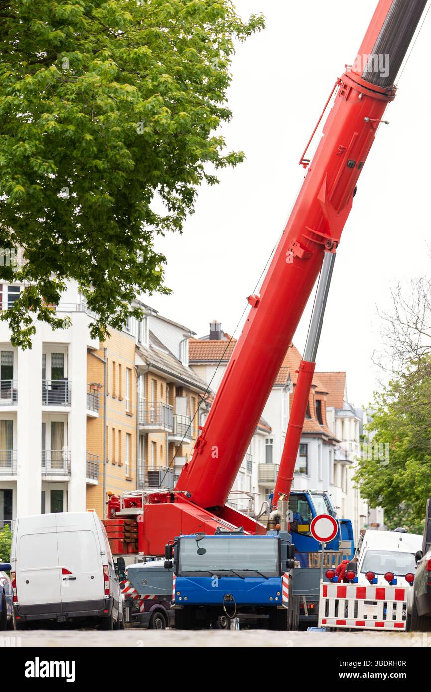 Extra heavy weight load mobile boom crane working on narrow european ...