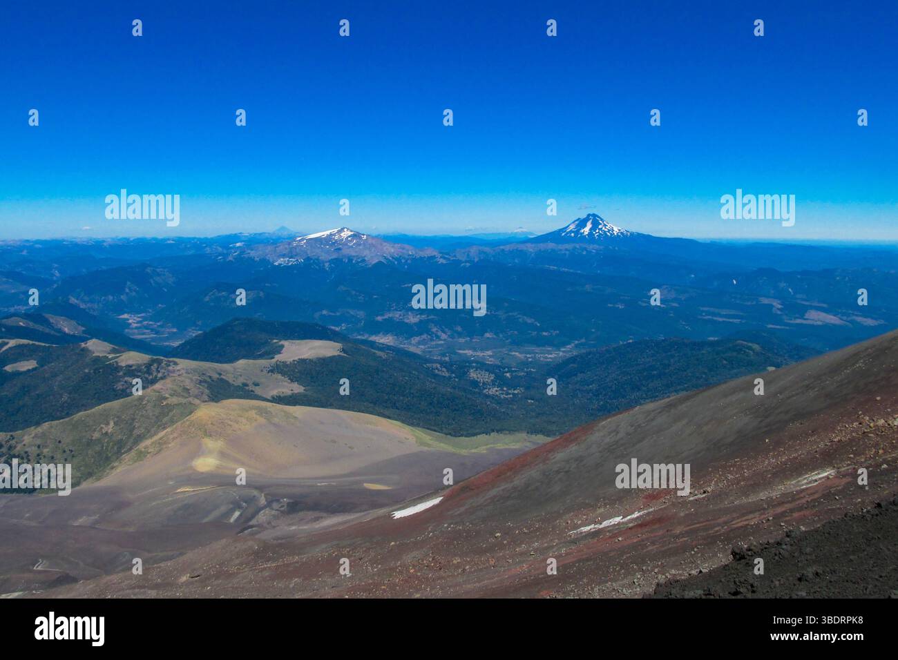 Volcanic landscape. Erupting volcano in South America in the Andes, Chile and Argentina ...