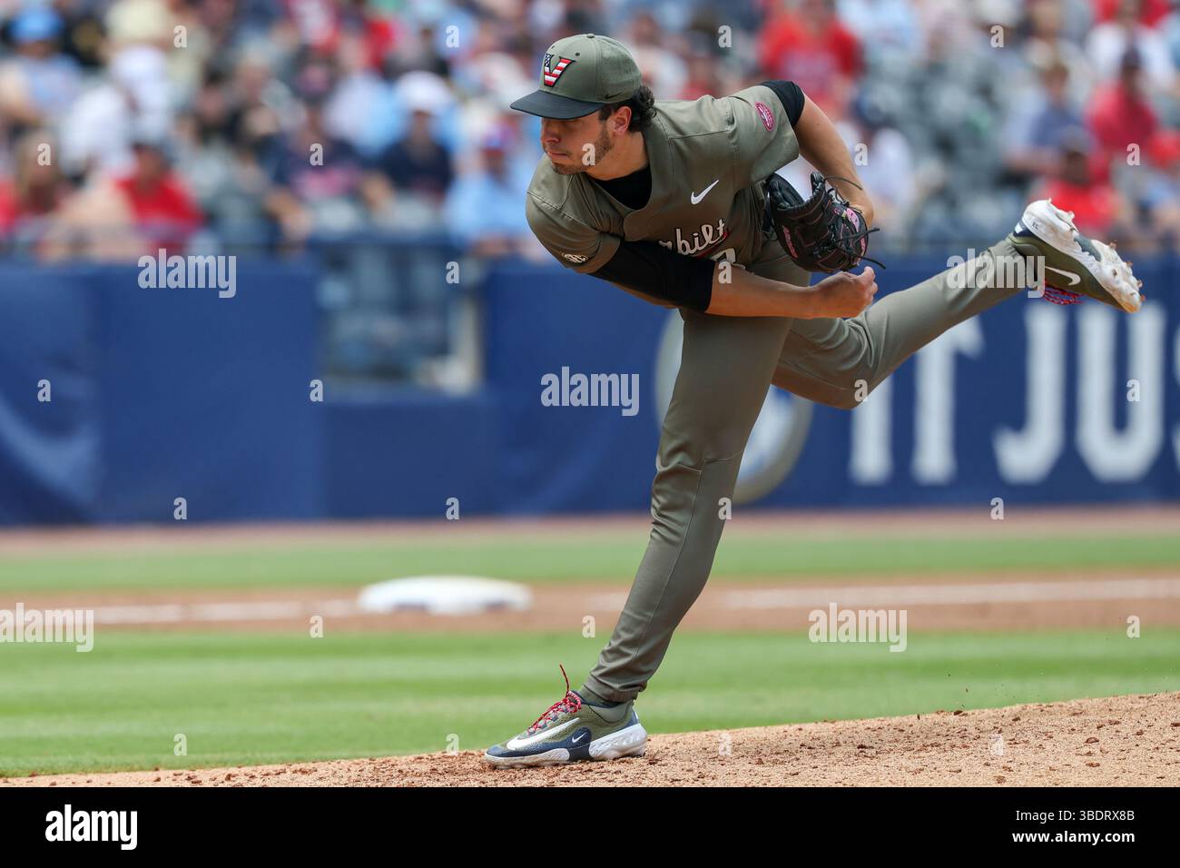 HOOVER, AL - MAY 25: Vanderbilt pitcher Luke Guth (33) pitches the ball ...