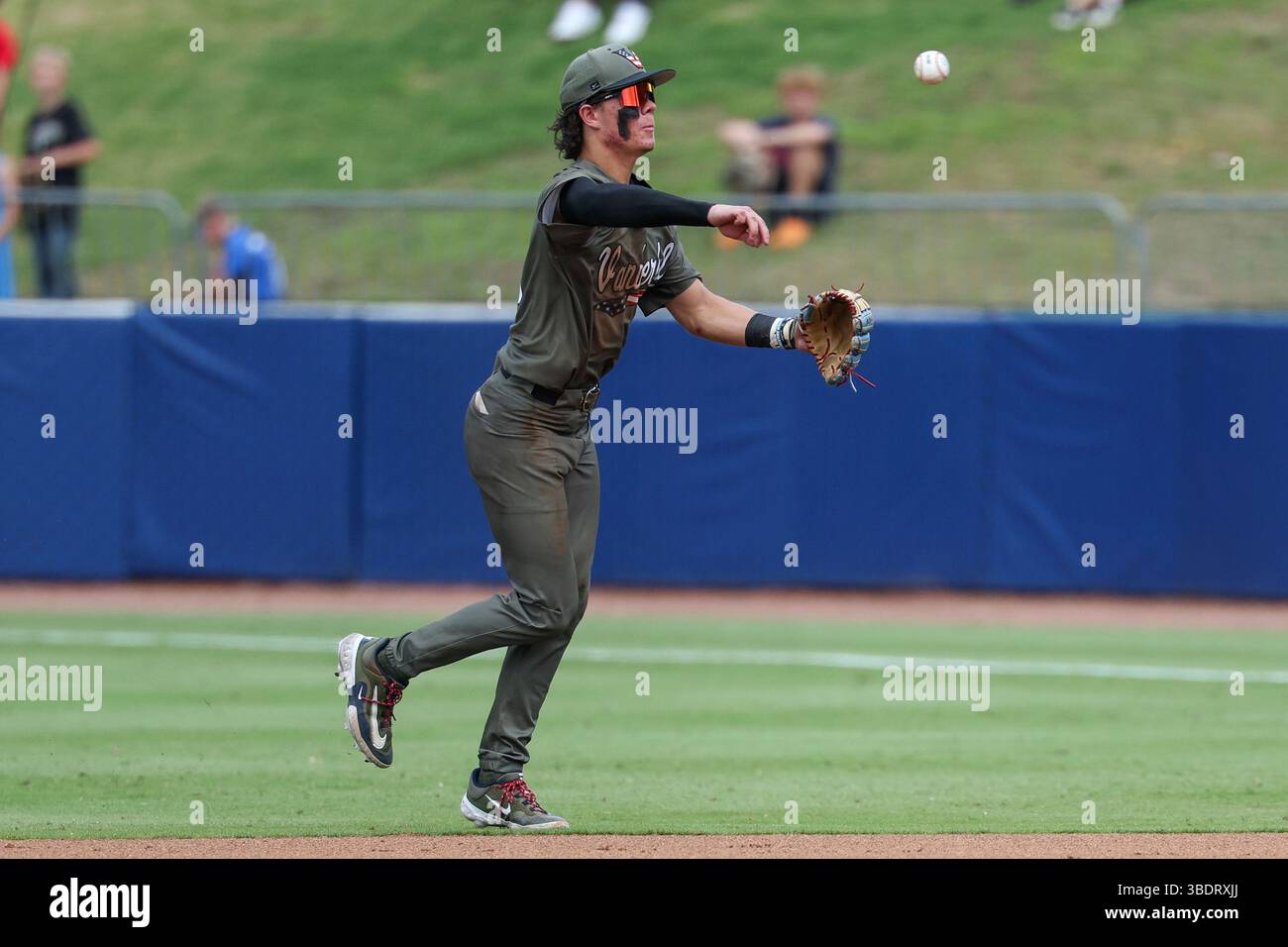 HOOVER, AL - MAY 25: Vanderbilt infielder Rustan Rigdon (19) throws out ...