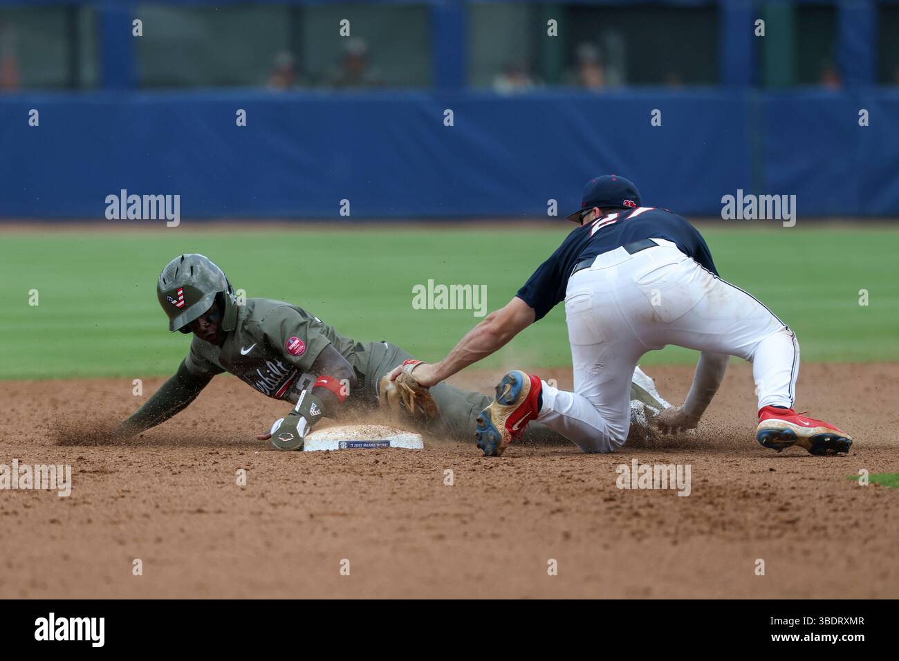 HOOVER, AL - MAY 25: Vanderbilt utility RJ Austin (42) touches the bag ...