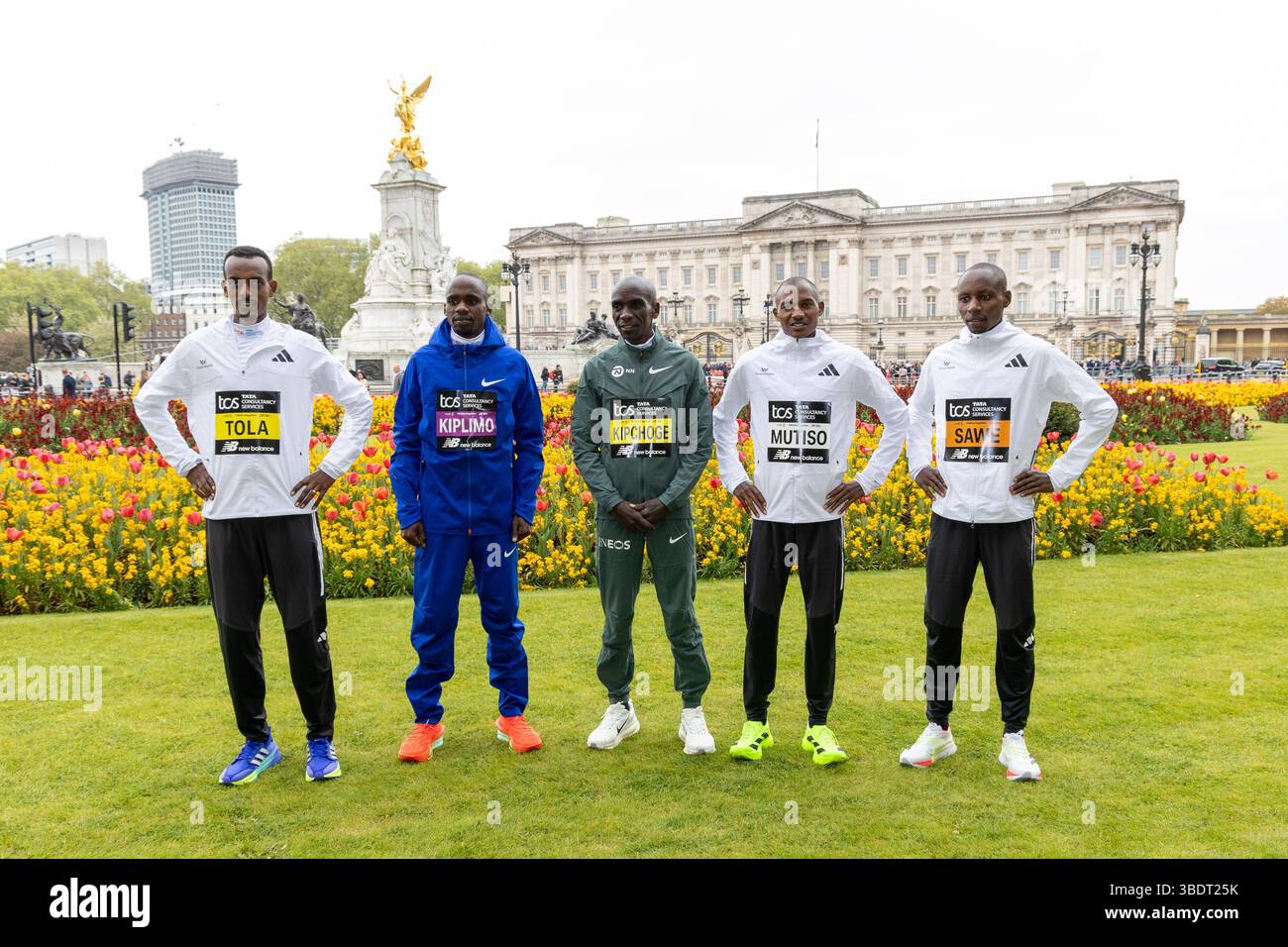Marathon Elite Men pose for photographs outside Buckingham Palace at the TCS London Marathon ...