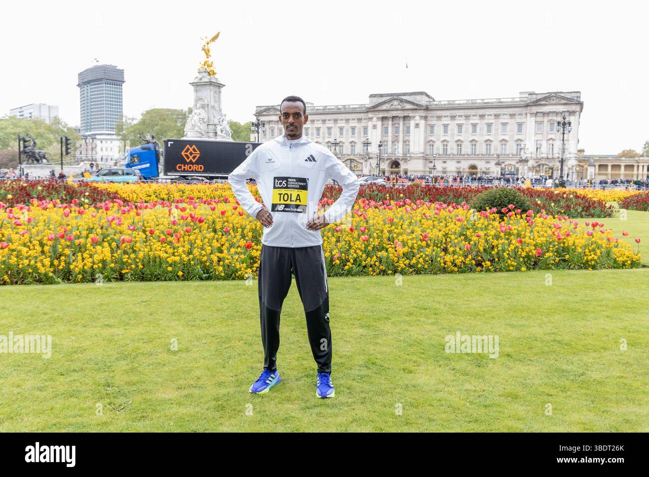 Marathon Elite Men pose for photographs outside Buckingham Palace at the TCS London Marathon ...