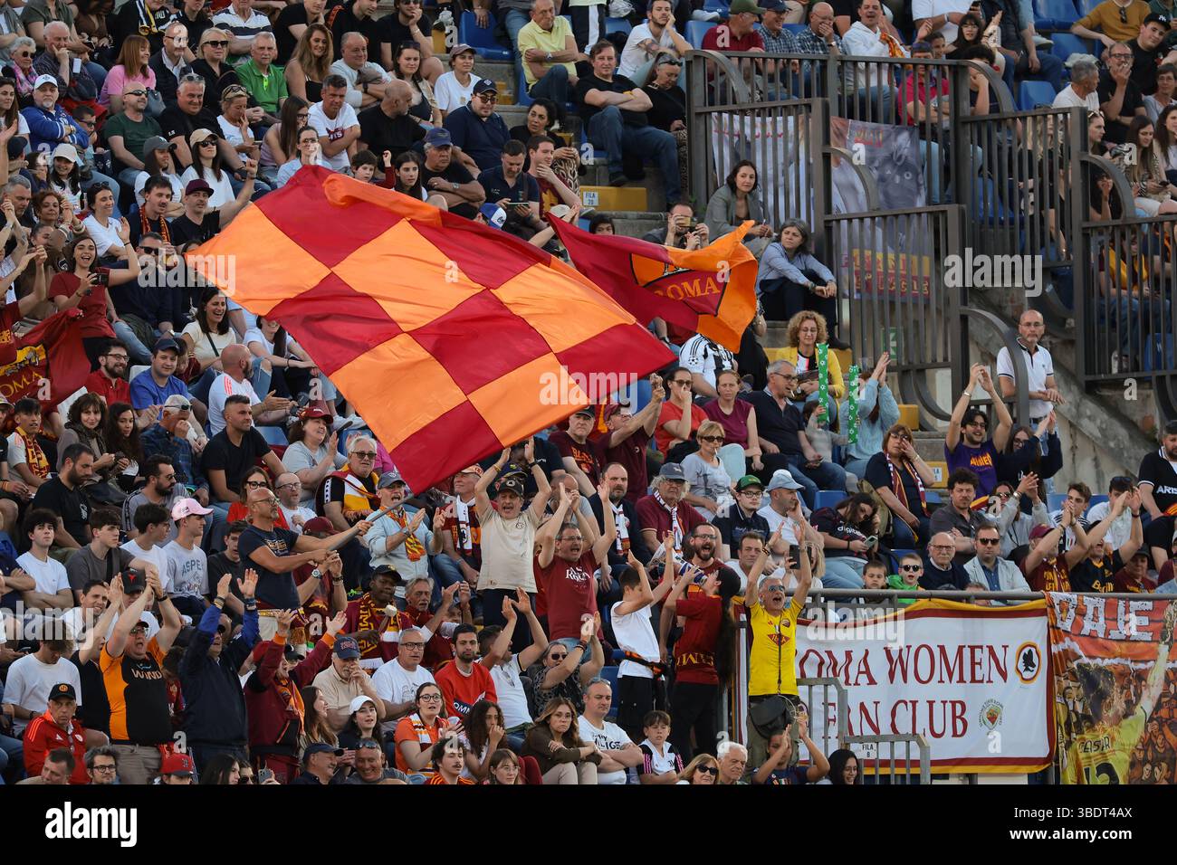 Como, Italy. 17th May, 2025. AS Roma fans cheer on their team during ...