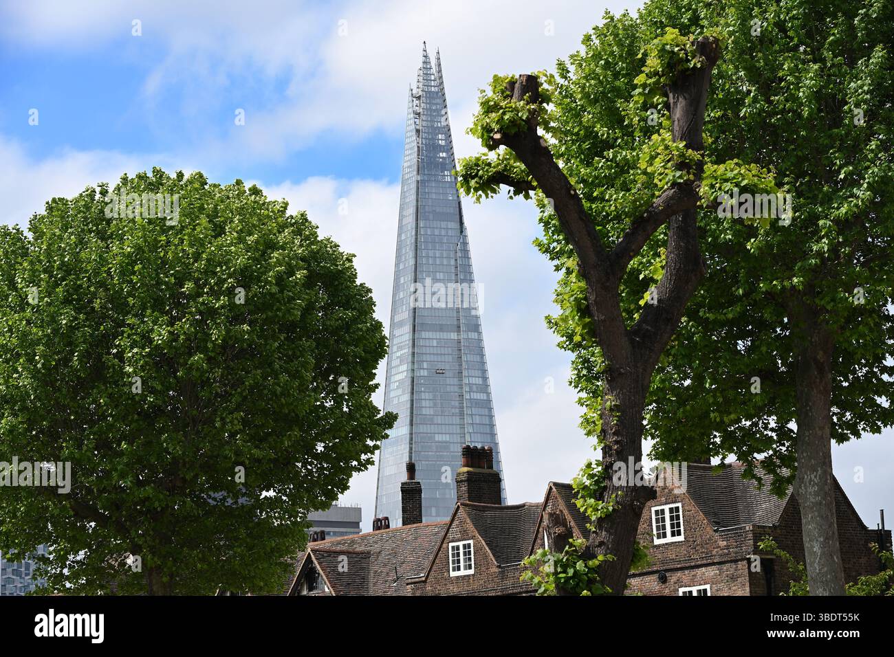 The Shard seen from inside The Tower of London - old & new Stock Photo ...