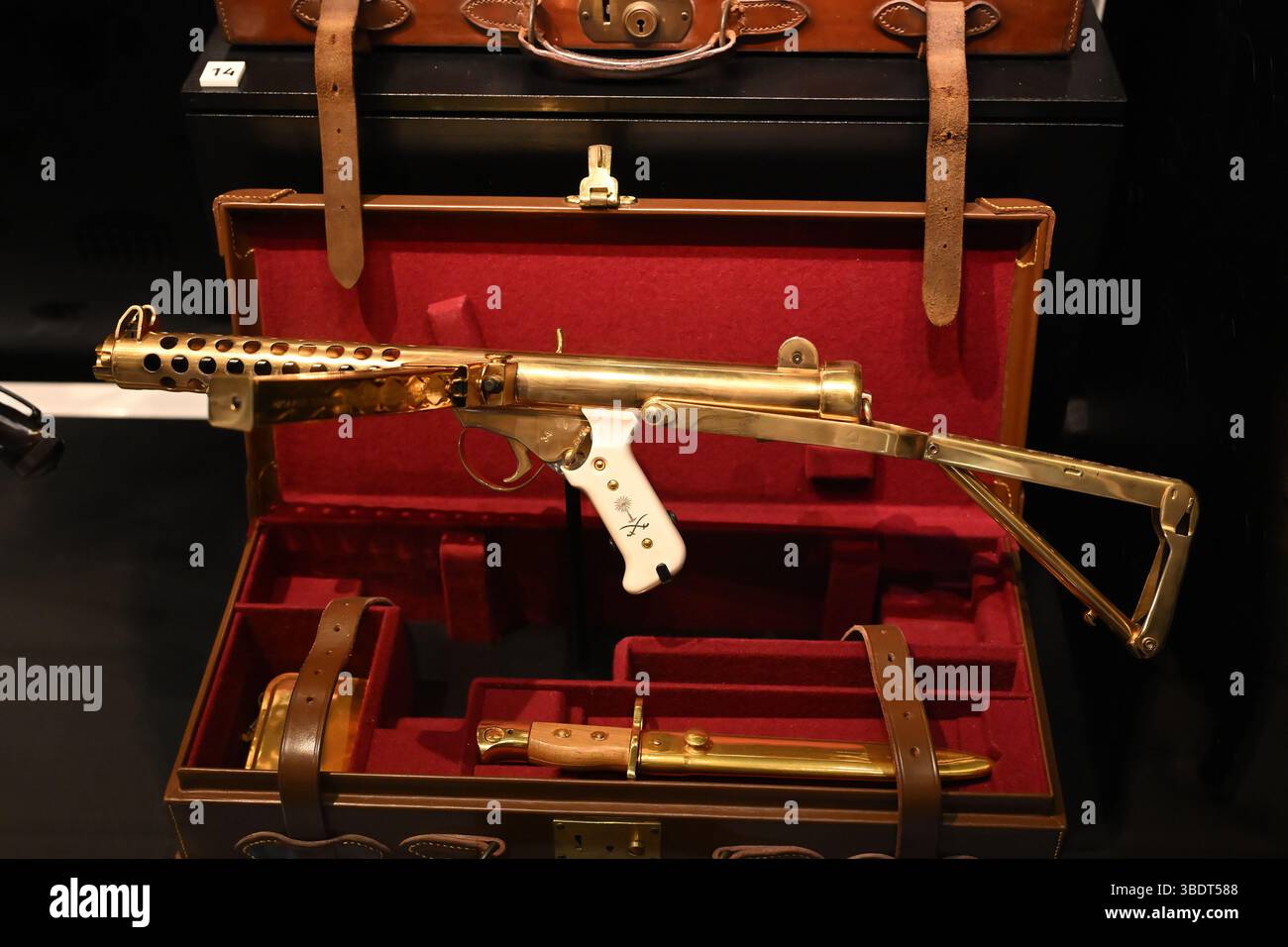 A gold-plated Sterling Mk 4 L2A3 submachine gun on display at The Tower ...