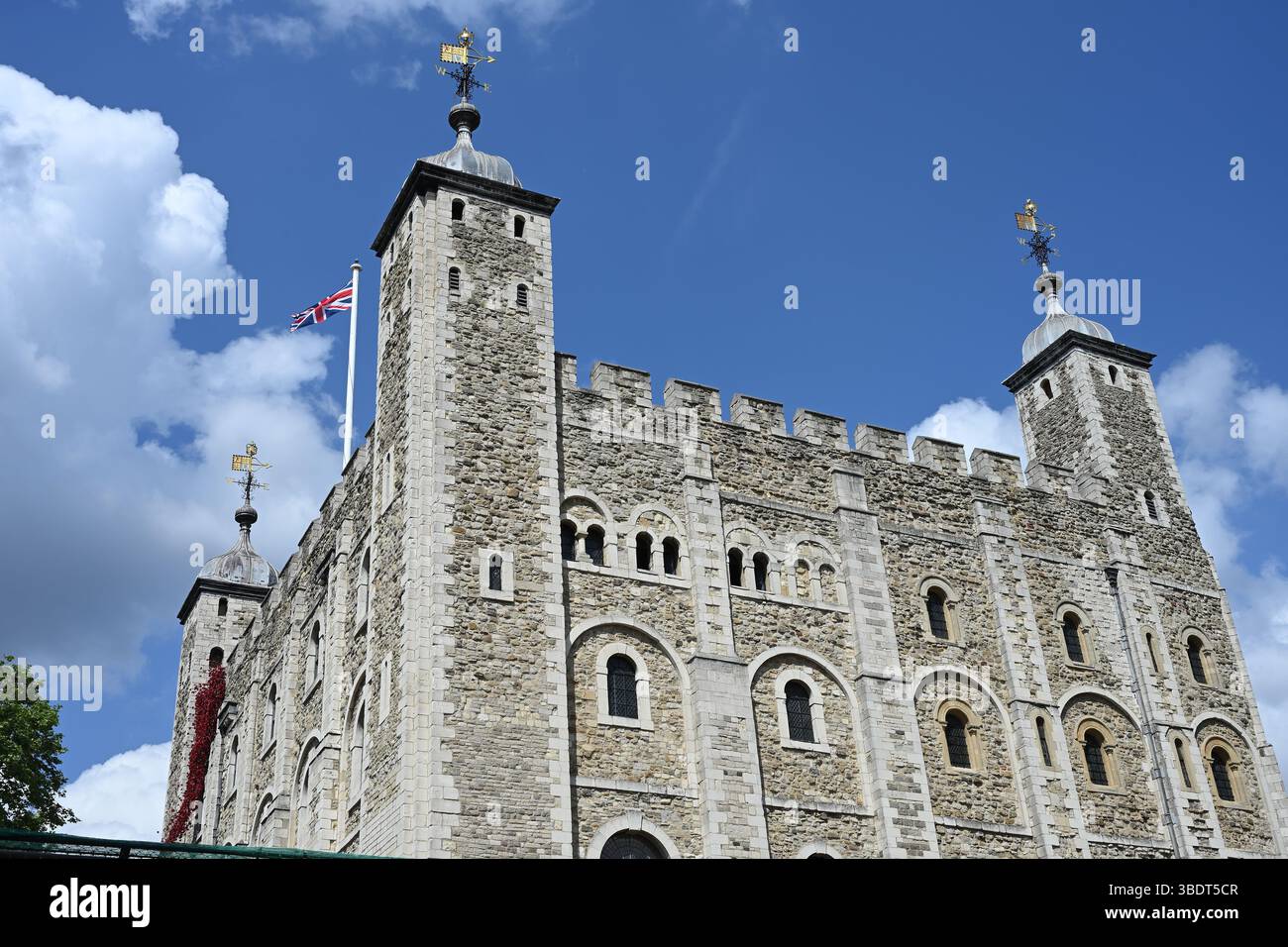 The White Tower inside the Tower of London with a Union Jack flag ...