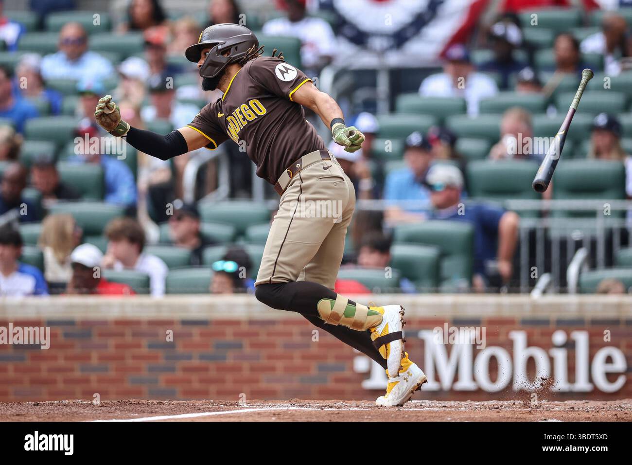 San Diego Padres' Fernando Tatis Jr. hits a single in the third inning ...