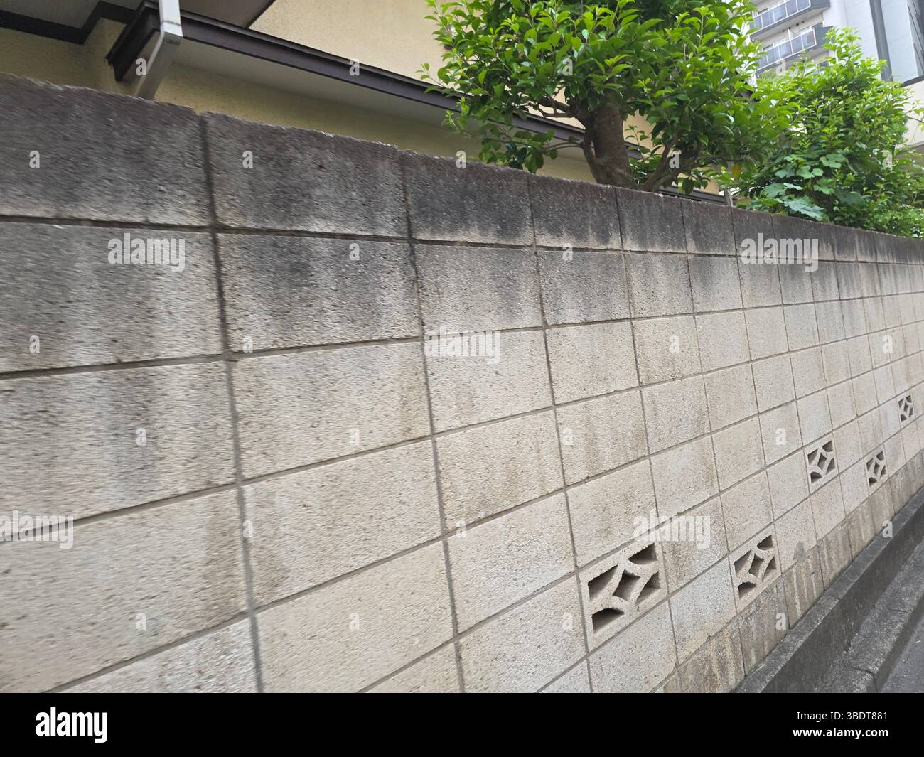 Brick Wall Side of Building Stock Photo - Alamy