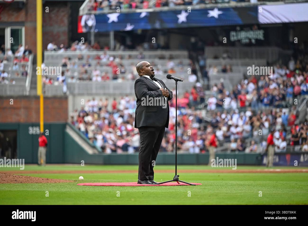 ATLANTA, GA - MAY 25: Timmothy Miller sings "God Bless America" during ...