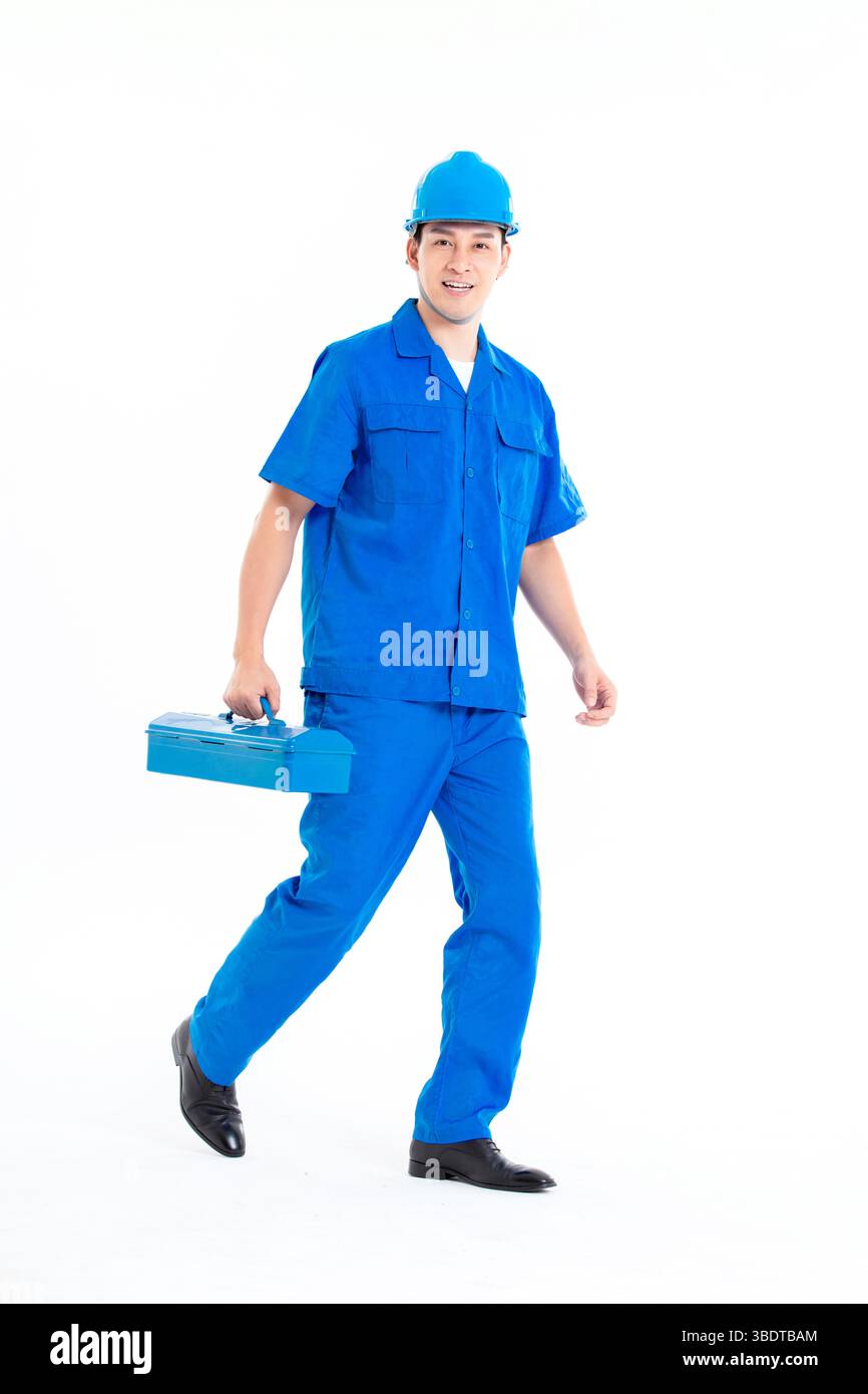 After-sales service personnel in blue workwear Stock Photo - Alamy