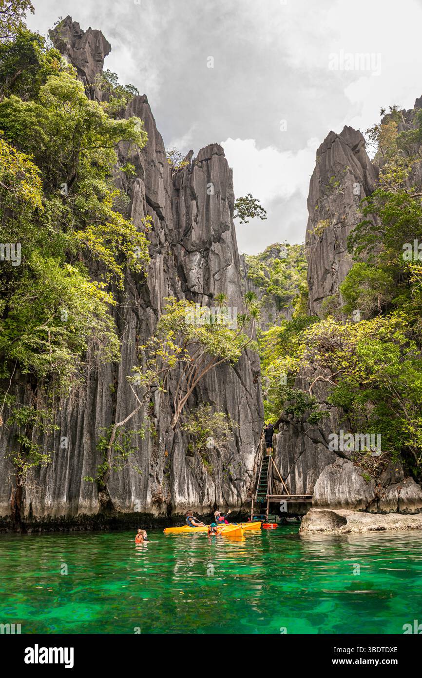 JANUARY 10, 2024, CORON, PHILIPPINES: People kayaking in the beautiful ...