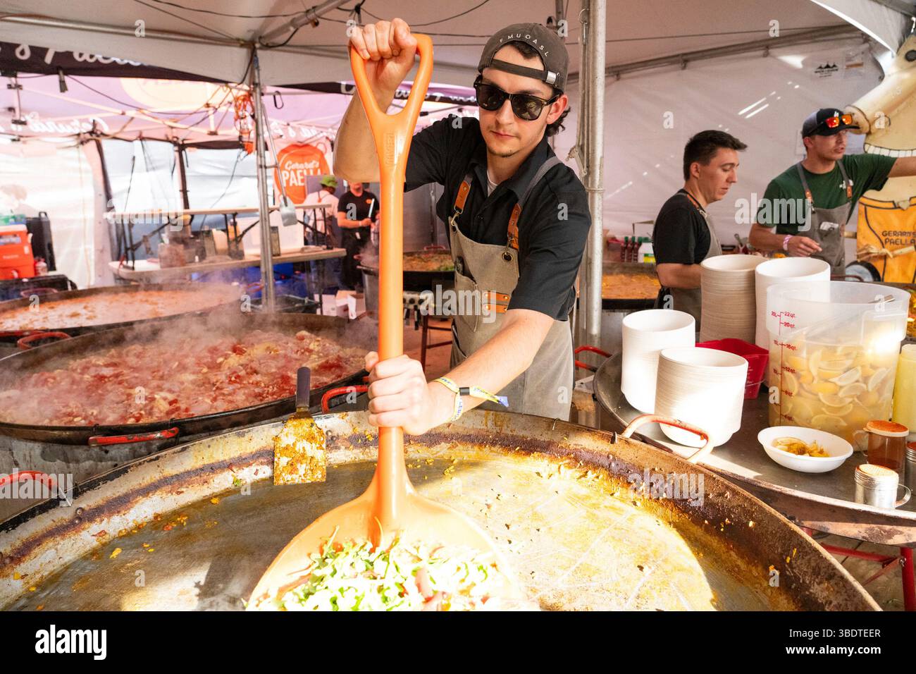 A team member of Gerard's Paella is seen at the 2025 BottleRock Napa ...