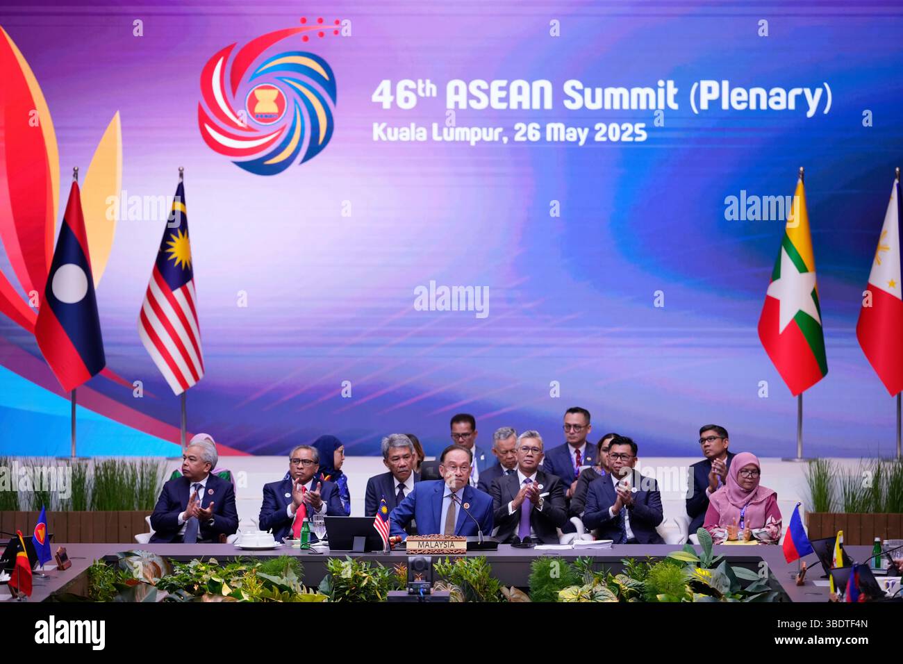 Malaysia's Prime Minister Anwar Ibrahim, center, attends the plenary session at the Association ...