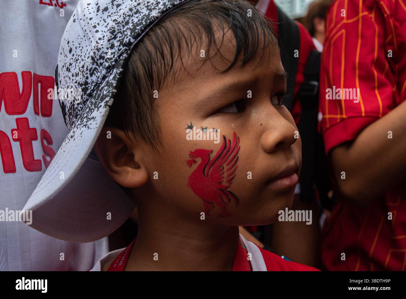 Bangkok, Thailand. 25th May, 2025. A Liverpool FC fan seen painting ...