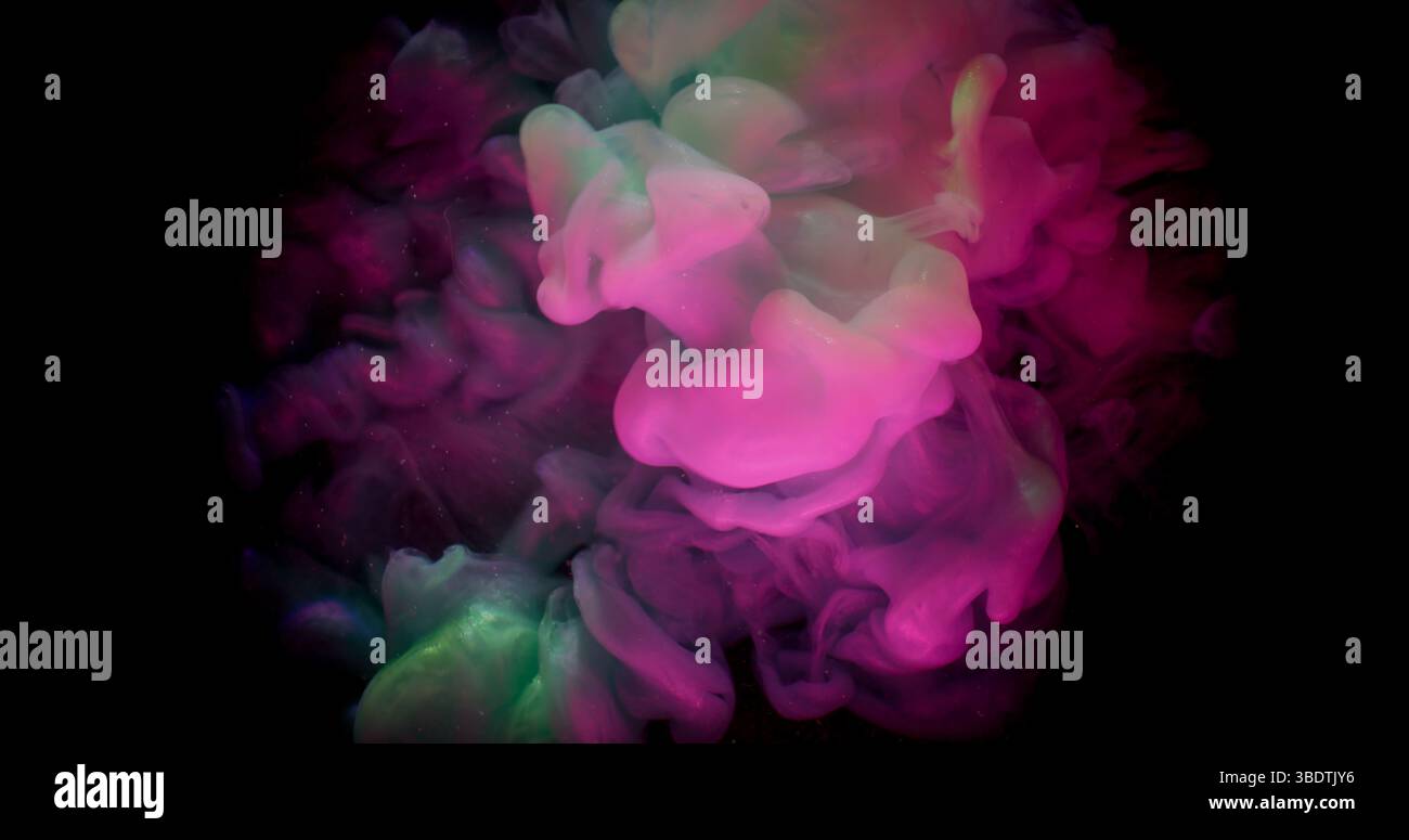 Ink puff color explosion underwater hi-res stock photography and images ...