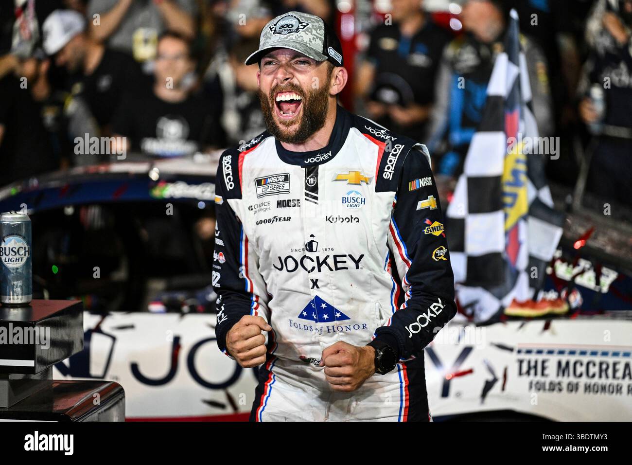 Ross Chastain celebrates in Victory Lane after winning a NASCAR Cup ...