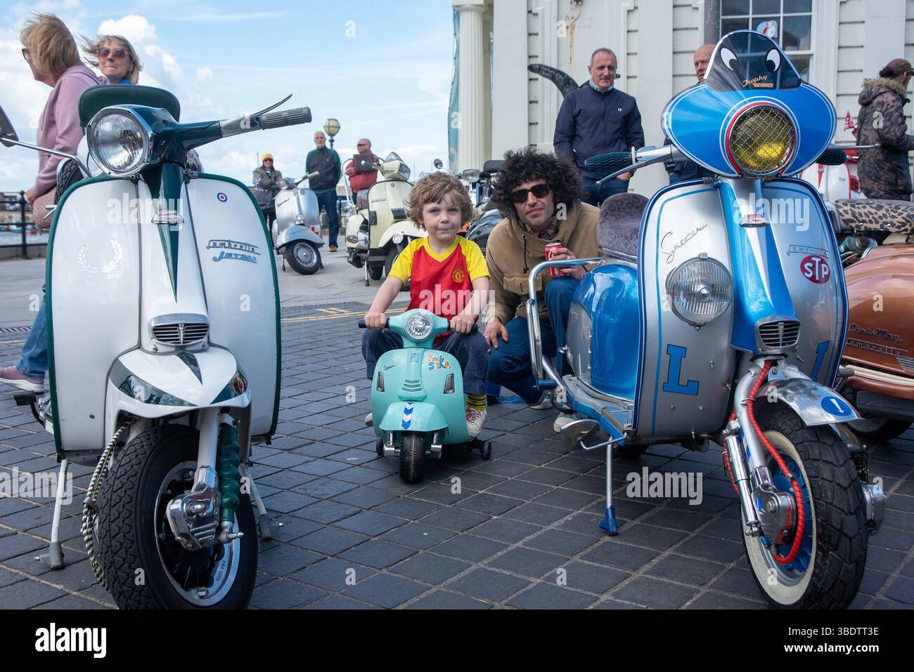 Margate, UK. 25th May, 2025. A child pose with his father and his ...