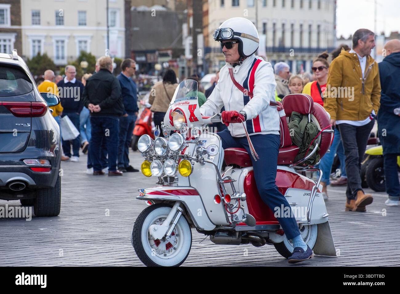 Margate, UK. 25th May, 2025. A mods arrives by his Lambretta scooter to ...