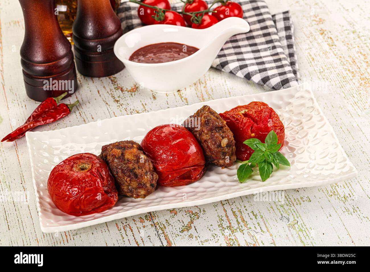 Turkish cuisine - Domatesli Kebab with minced meat and tomato Stock ...