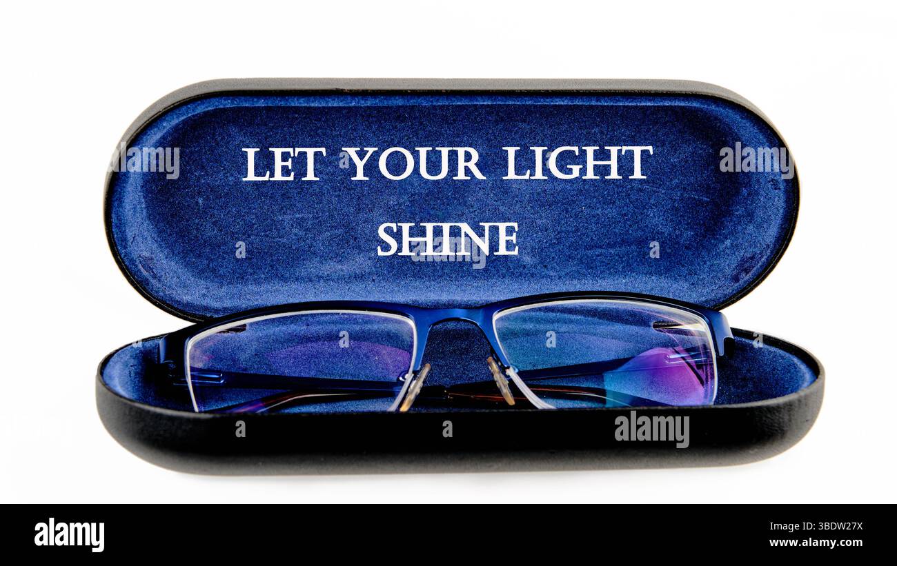 Best motivational quotes LET YOUR LIGHT SHINE Stock Photo - Alamy