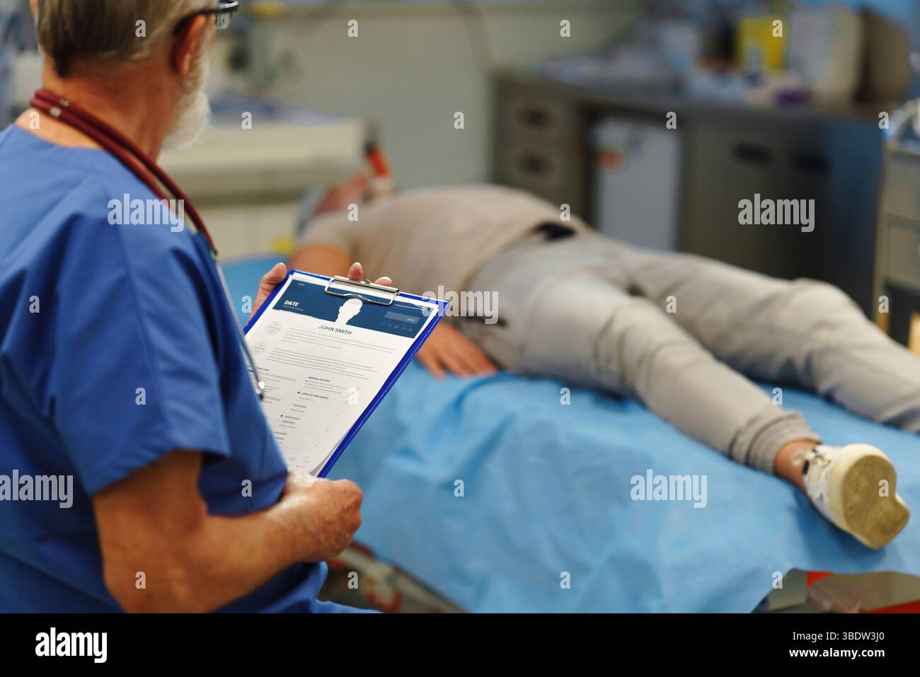 Medical professional examining health record patient lying on ...