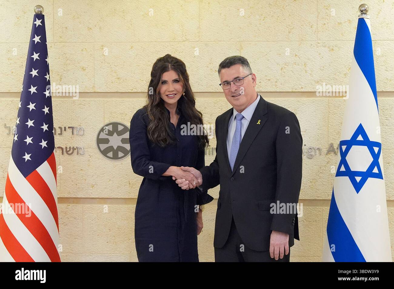 U.S. Homeland Security Secretary Kristi Noem shakes hands with Israel's ...