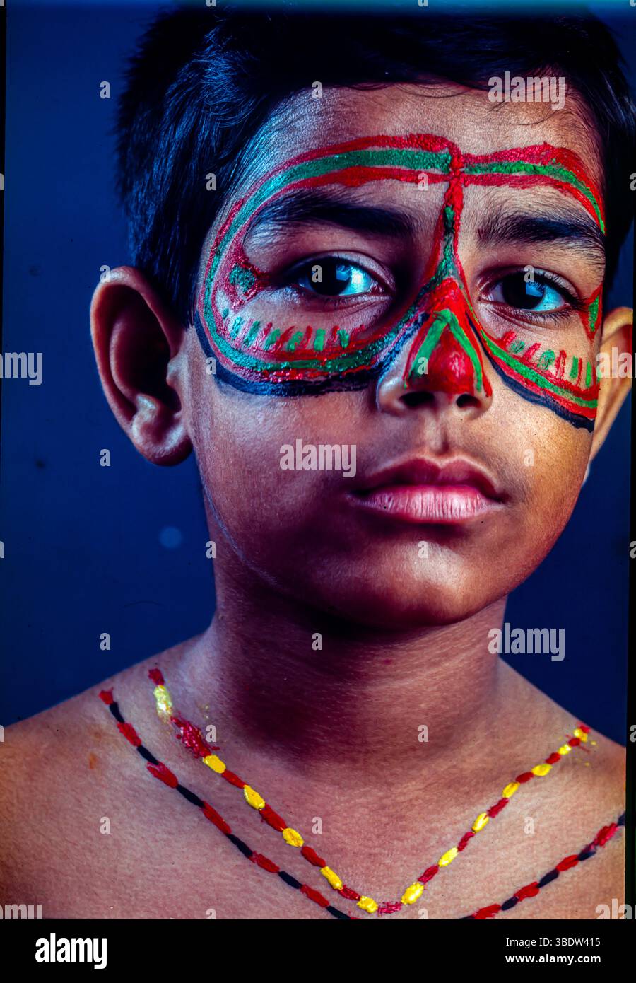 Children wearing Face colours as Masks Stock Photo - Alamy