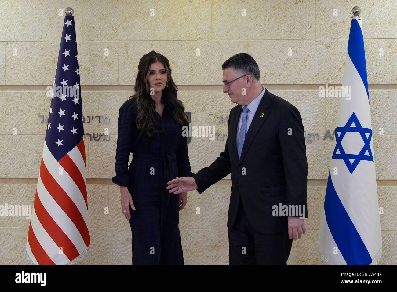 U.S. Homeland Security Secretary Kristi Noem shakes hands with Israel's ...