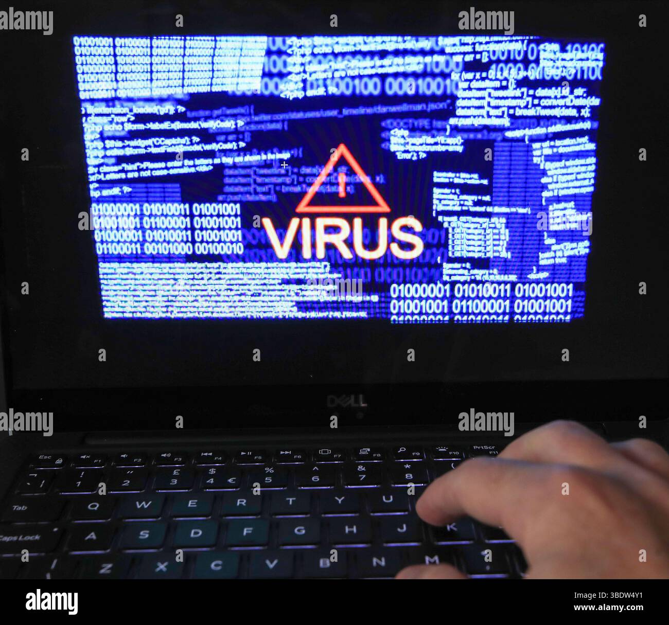 File photo dated 26/12/19 of a laptop screen showing a computer virus ...