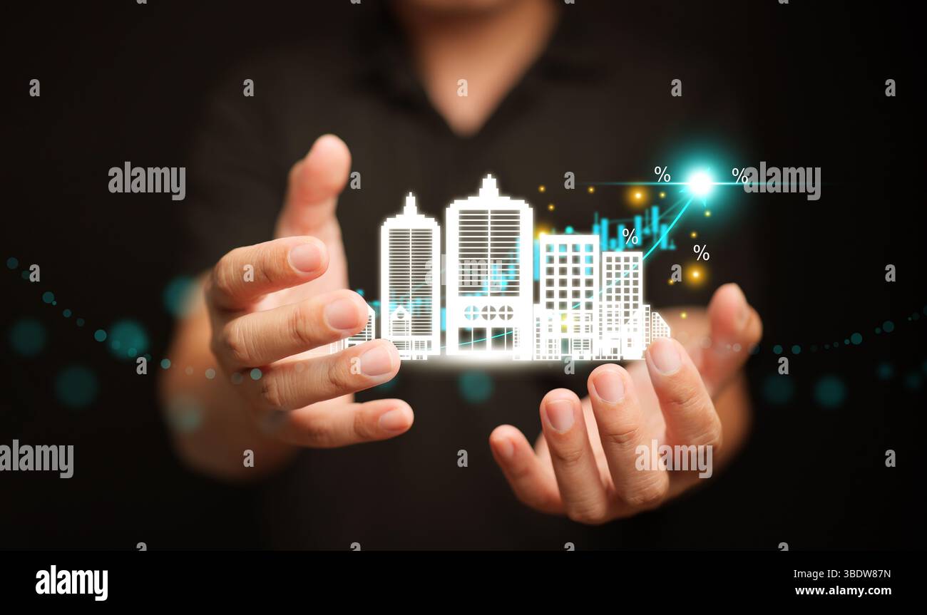 Real estate growth concept with building icons and rising curve on hand ...