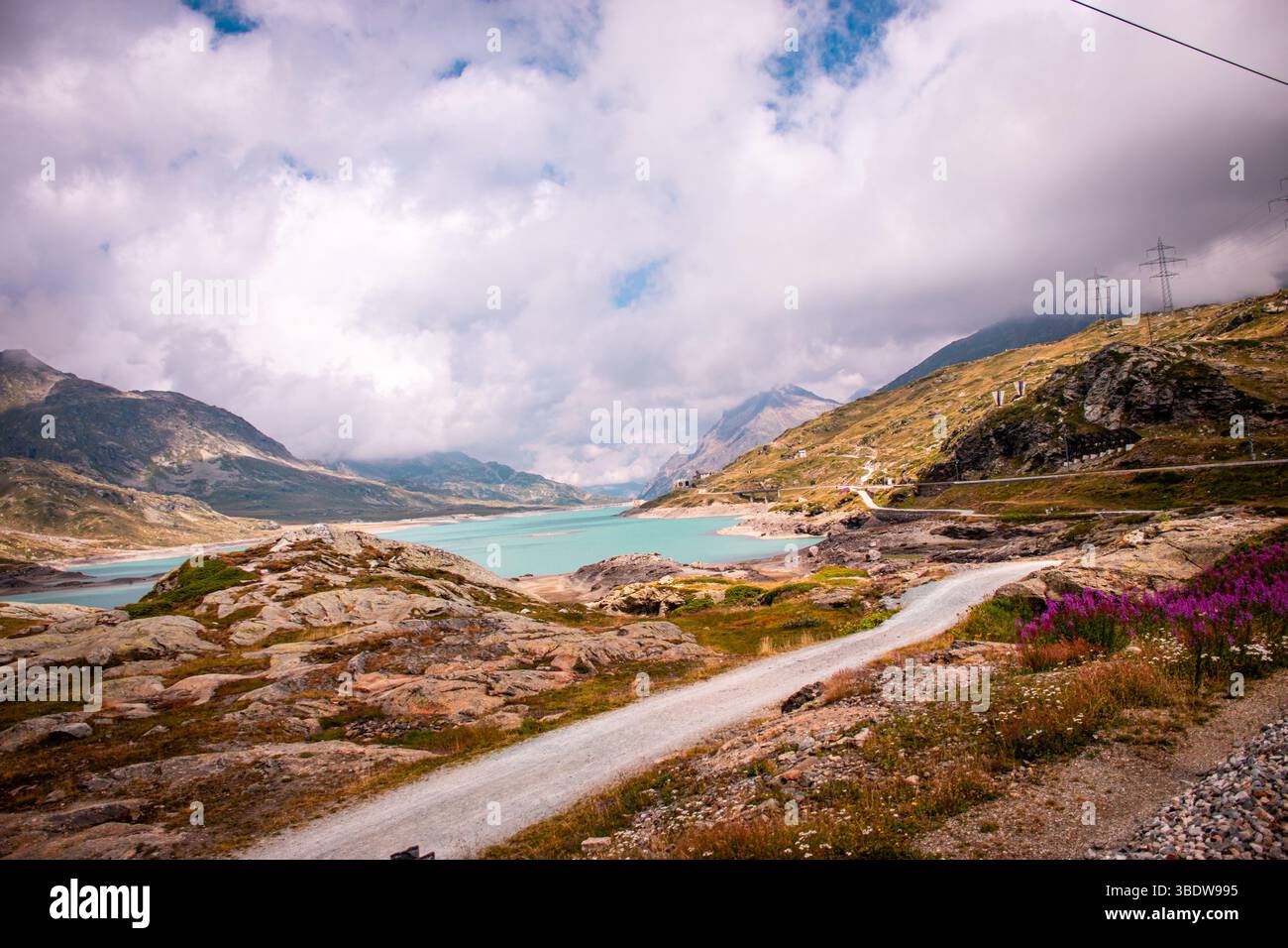 Crystal-clear lake nestled among Swiss mountains, reflecting the beauty ...