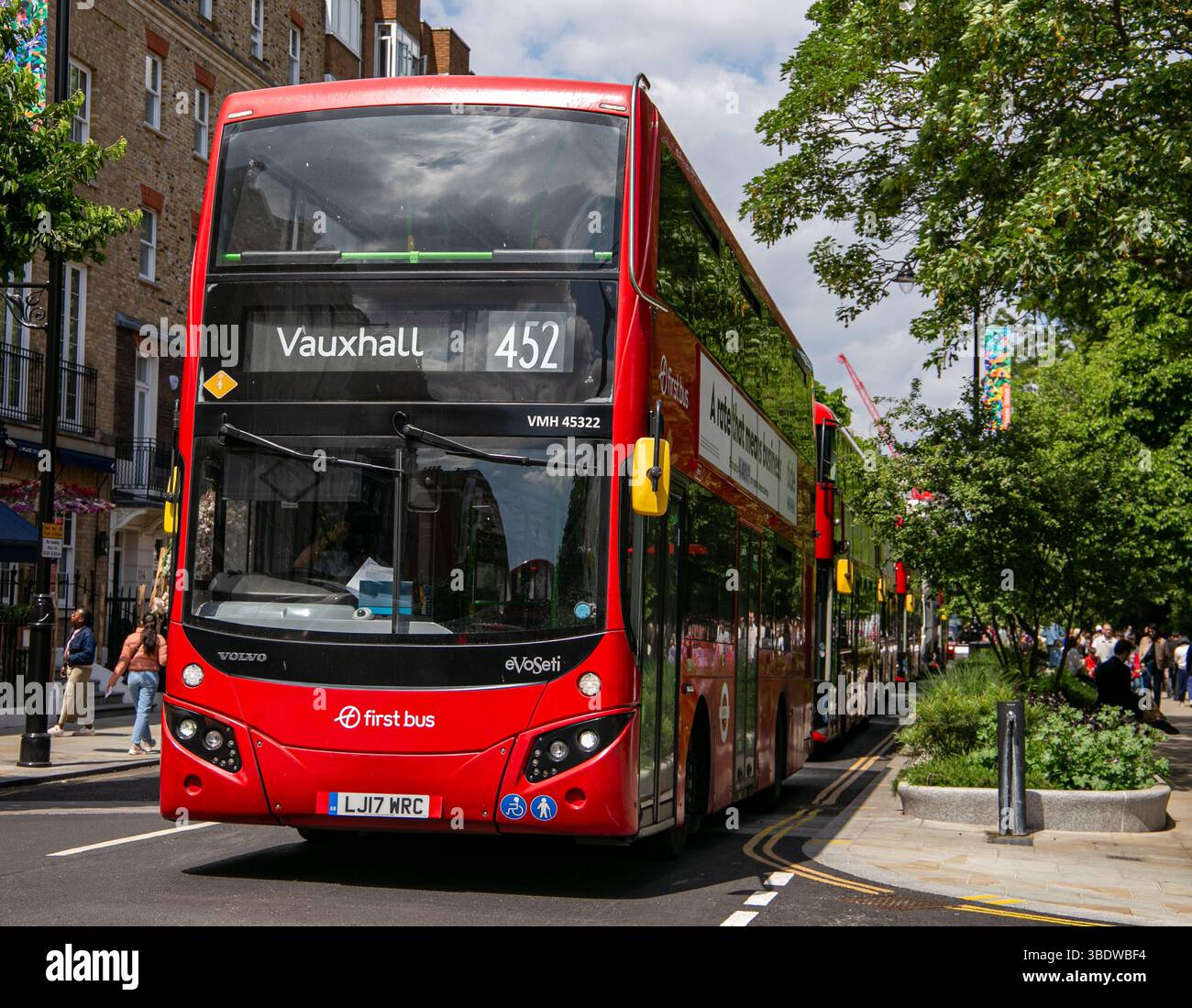 Red double-decker bus on route 452 in Vauxhall, London, in a street ...