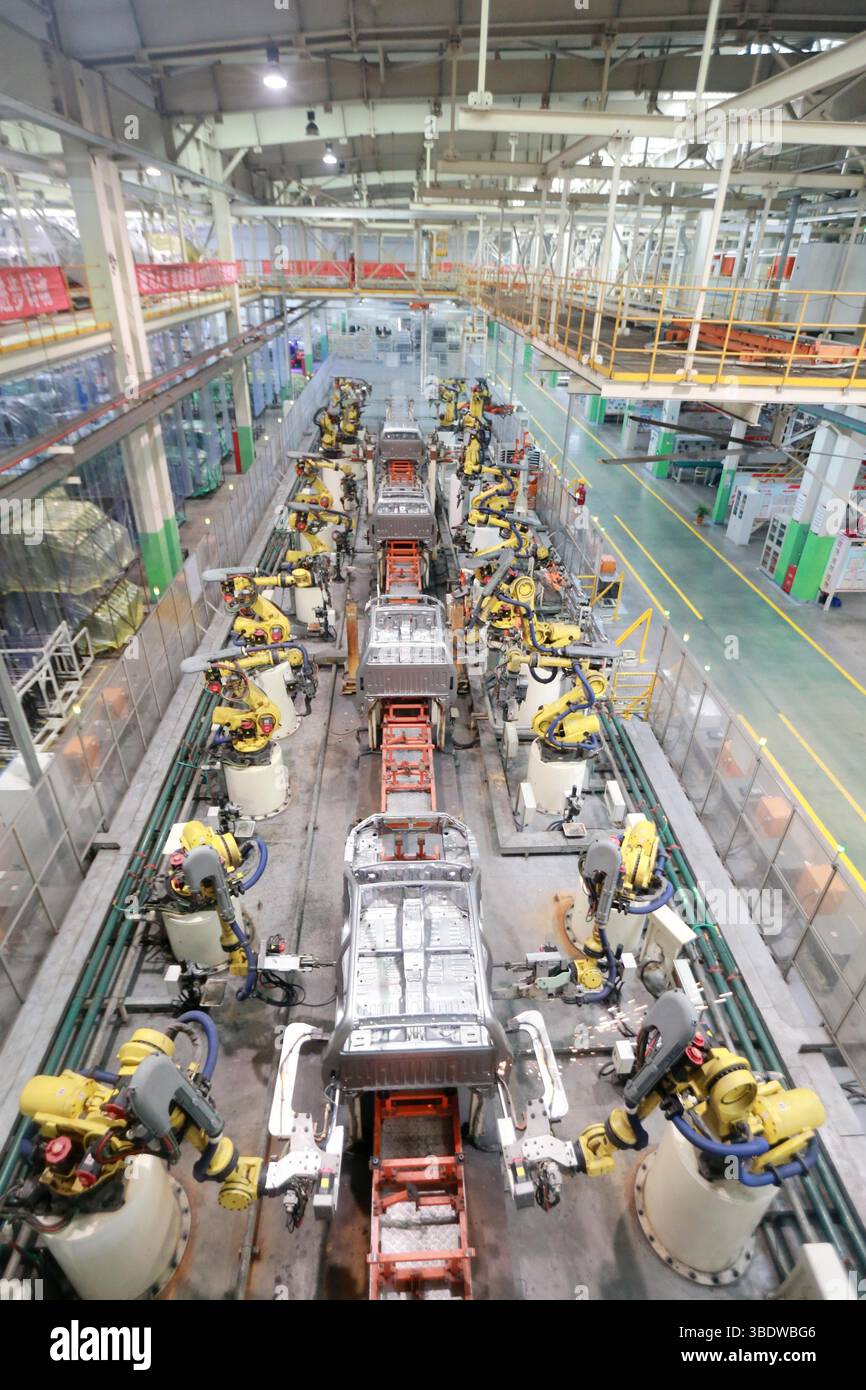 Busy smart assembly line of an auto manufacturing enterprise in ...