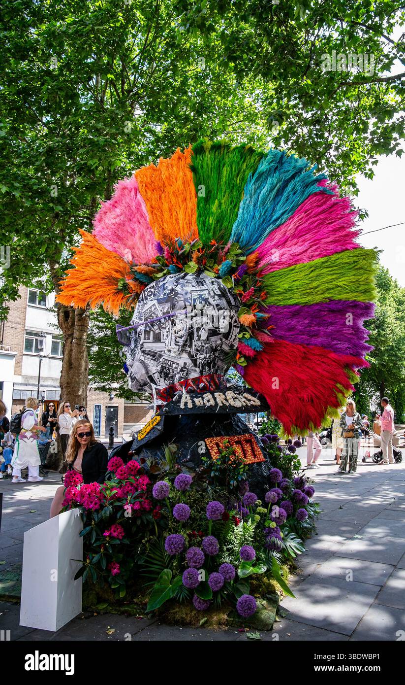 Vibrant floral art installation on a street features a colorful punk ...