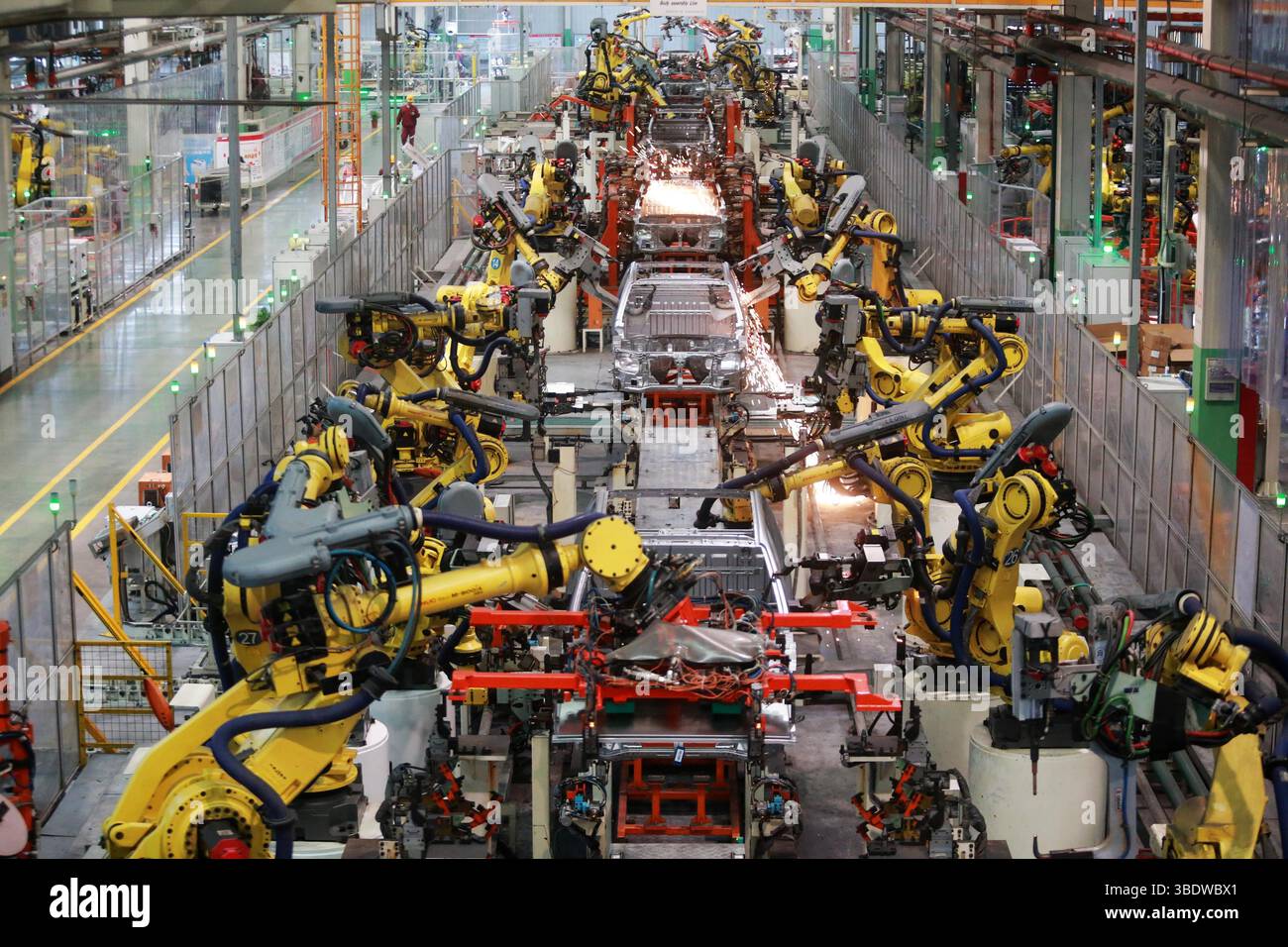 Busy smart assembly line of an auto manufacturing enterprise in ...