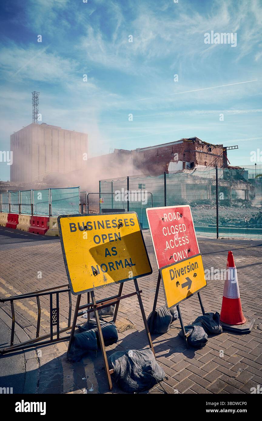 Dust settling on a demolition site in the early morning sun Stock Photo - Alamy