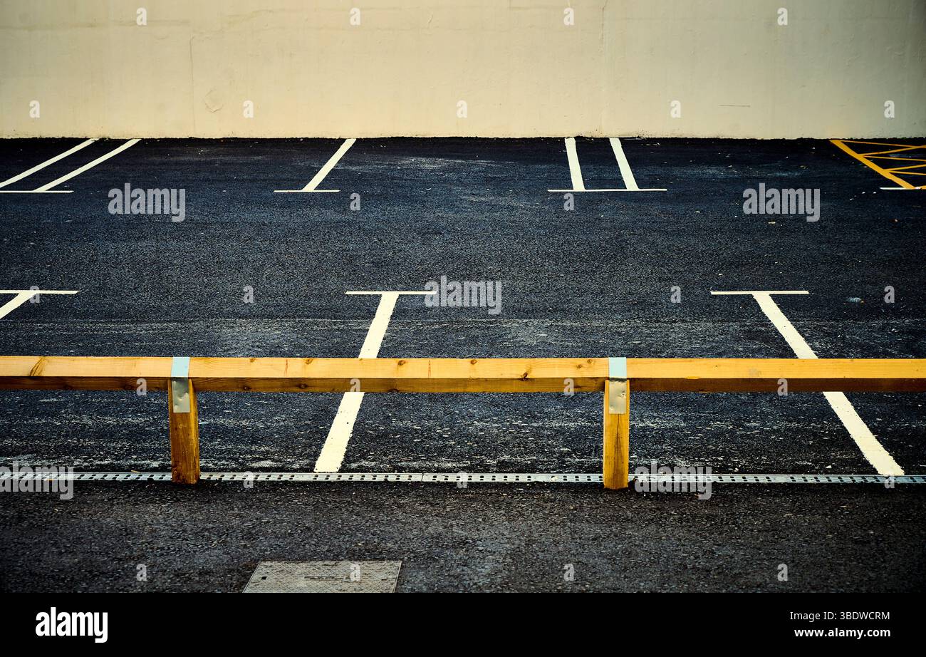 Car parking bays marked out in white Stock Photo - Alamy