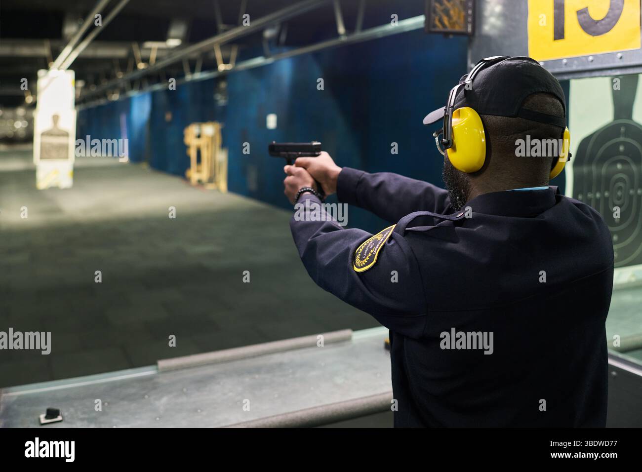 Shooting range safety specialist hi-res stock photography and images ...