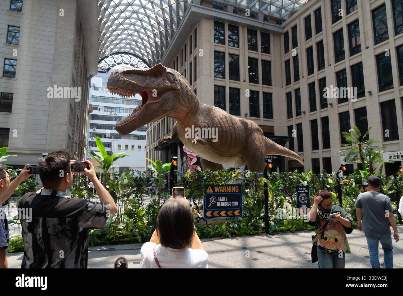 SHANGHAI, CHINA - MAY 26, 2025 - Citizens watched a huge "Tyrannosaurus ...