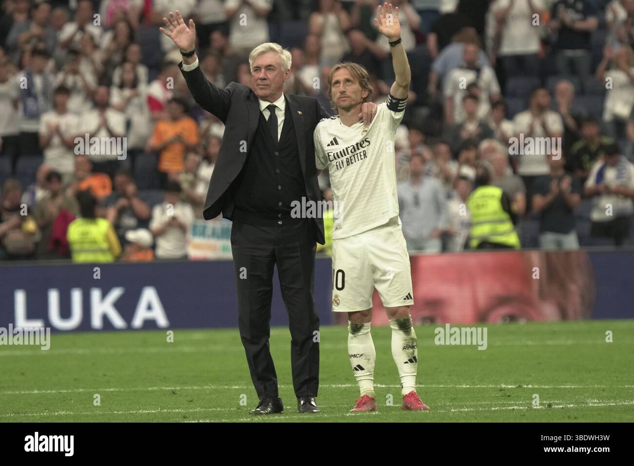 Real Madrid's Luka Modric and head coach Carlo Ancelotti applaud fans ...