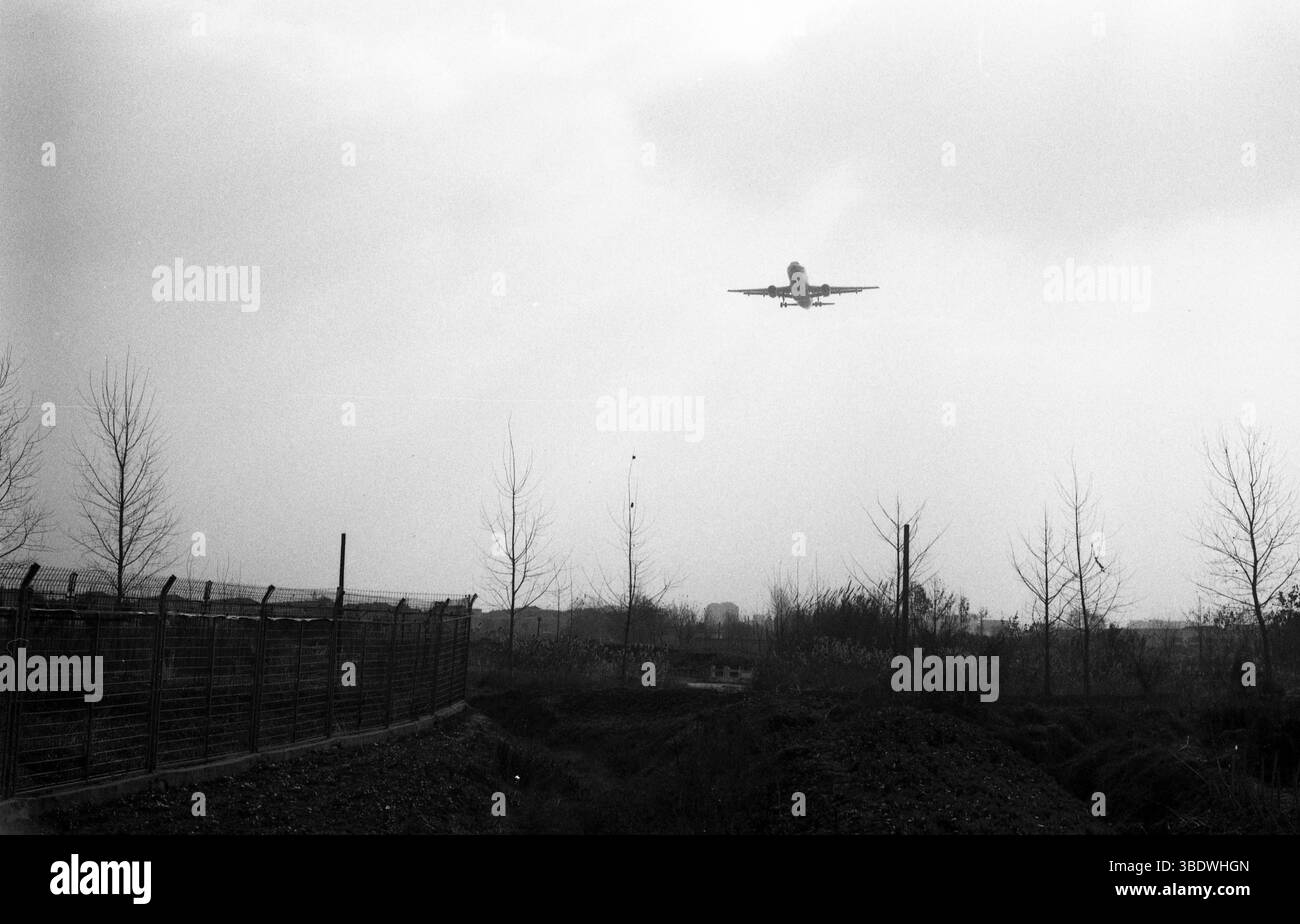 Commercial Airliner on Final Approach Above Perimeter Fence Stock Photo ...