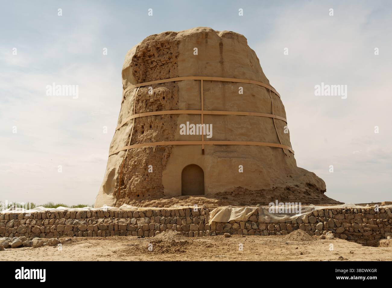 A large, crumbling building with a wooden frame Stock Photo - Alamy